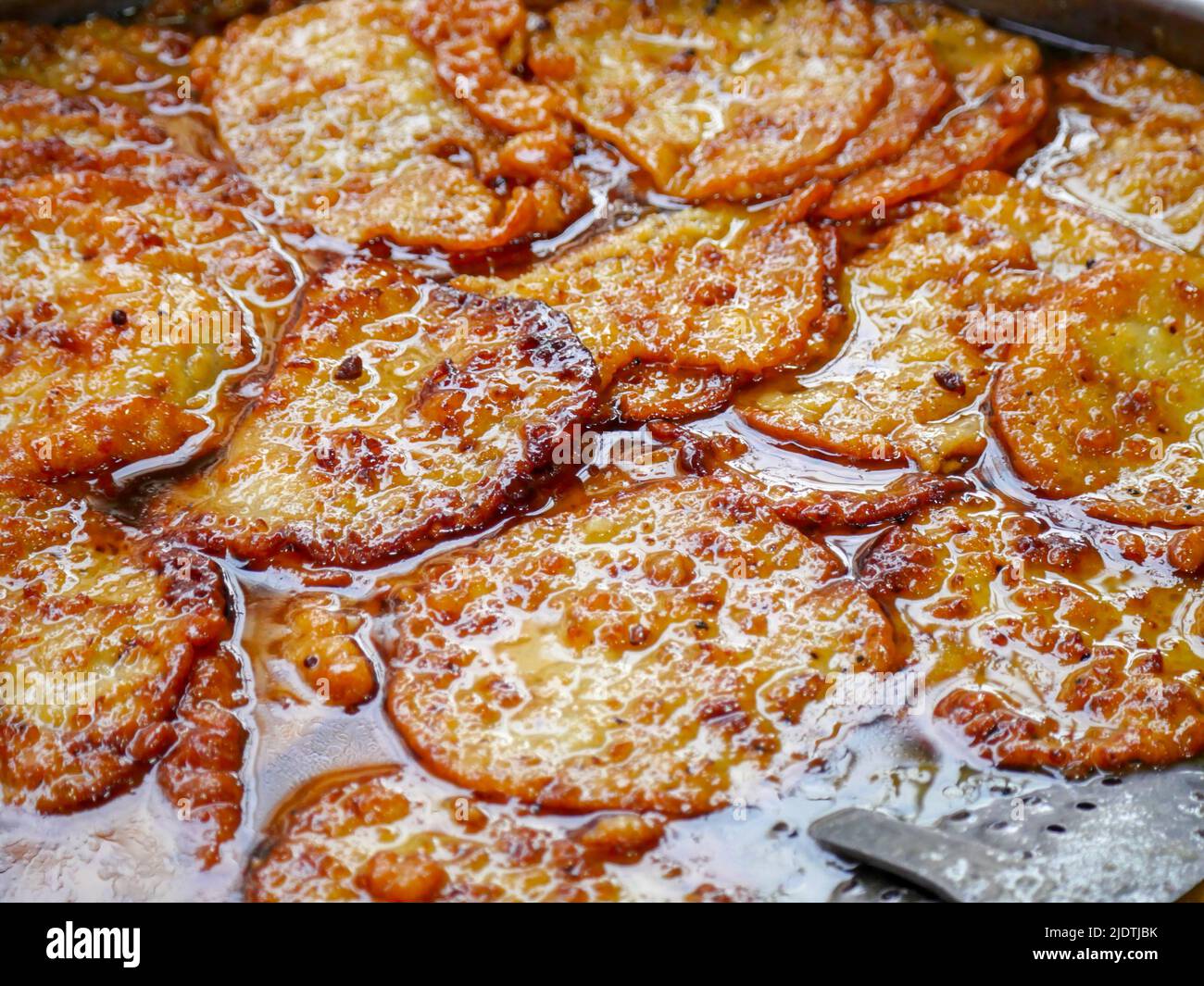Malpua - Traditional Indian sweet pancake coated in sugar syrup made ...