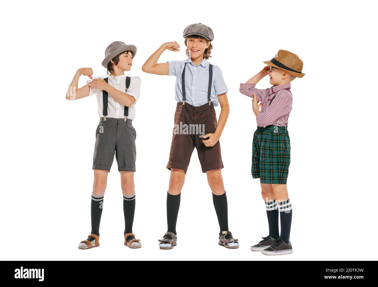 Cheerful little boys, stylish kids wearing retro clothes posing ...