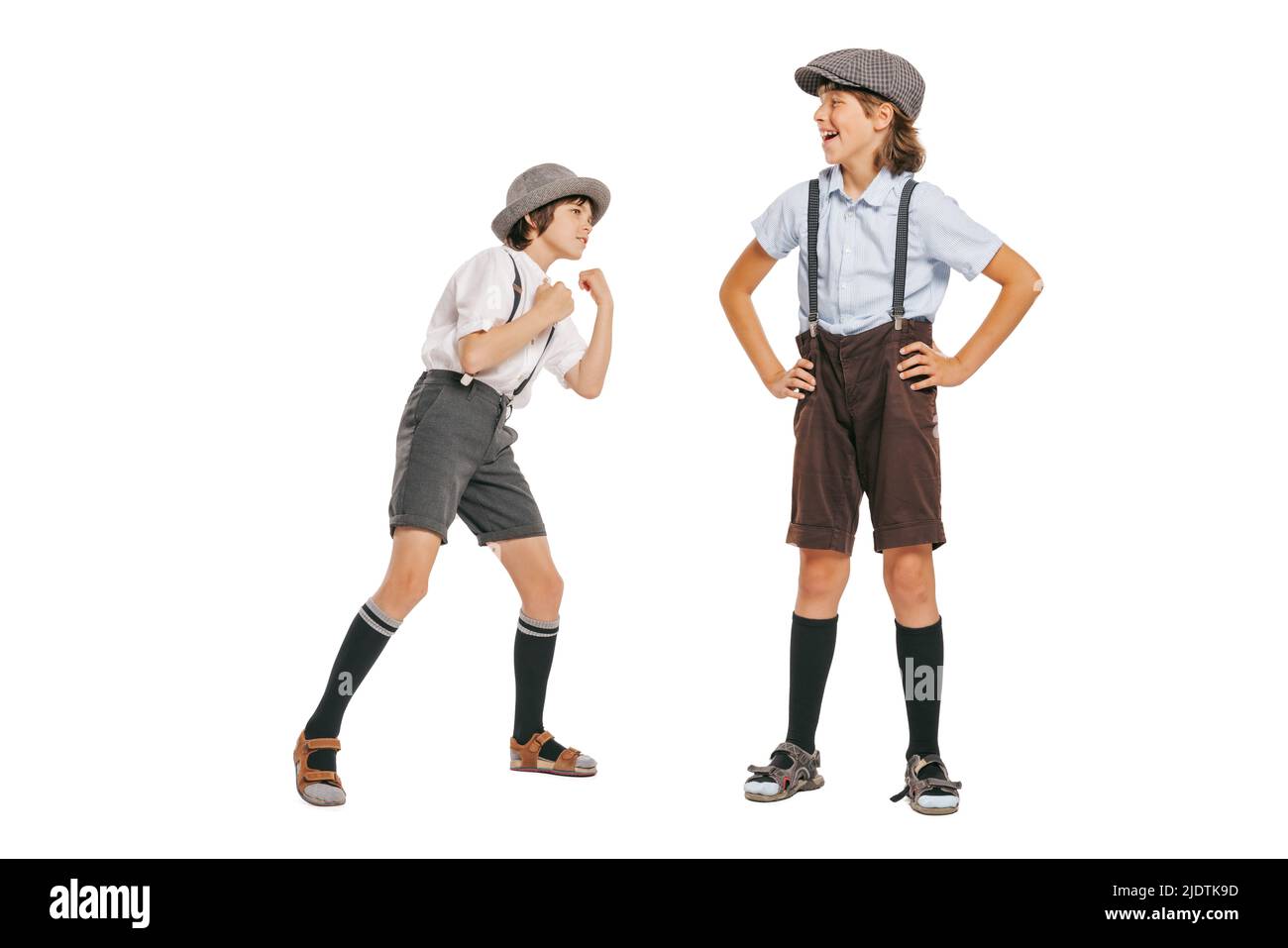 Cheerful little boys, stylish kids wearing retro clothes posing ...