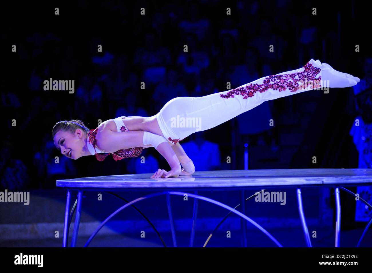 Woman acrobat performing in the ring of the circus. June 10, 2018. Kyiv ...