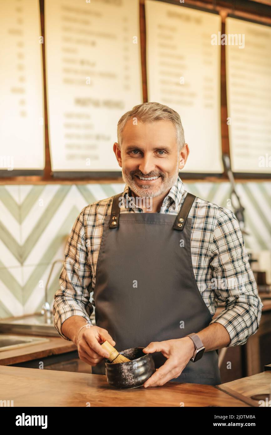 Man standing at bar hi-res stock photography and images - Alamy