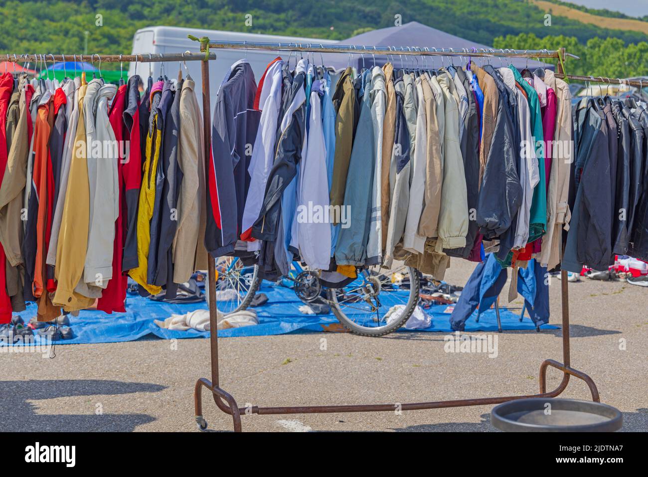 Second Hand Jackets Tops at Railing Flea Market Stock Photo - Alamy
