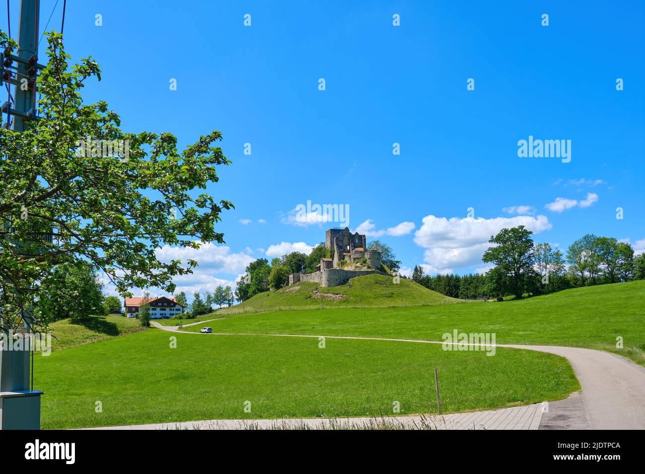 Countryside scenery and ruins of Sulzberg Castle in the Allgaeu region ...
