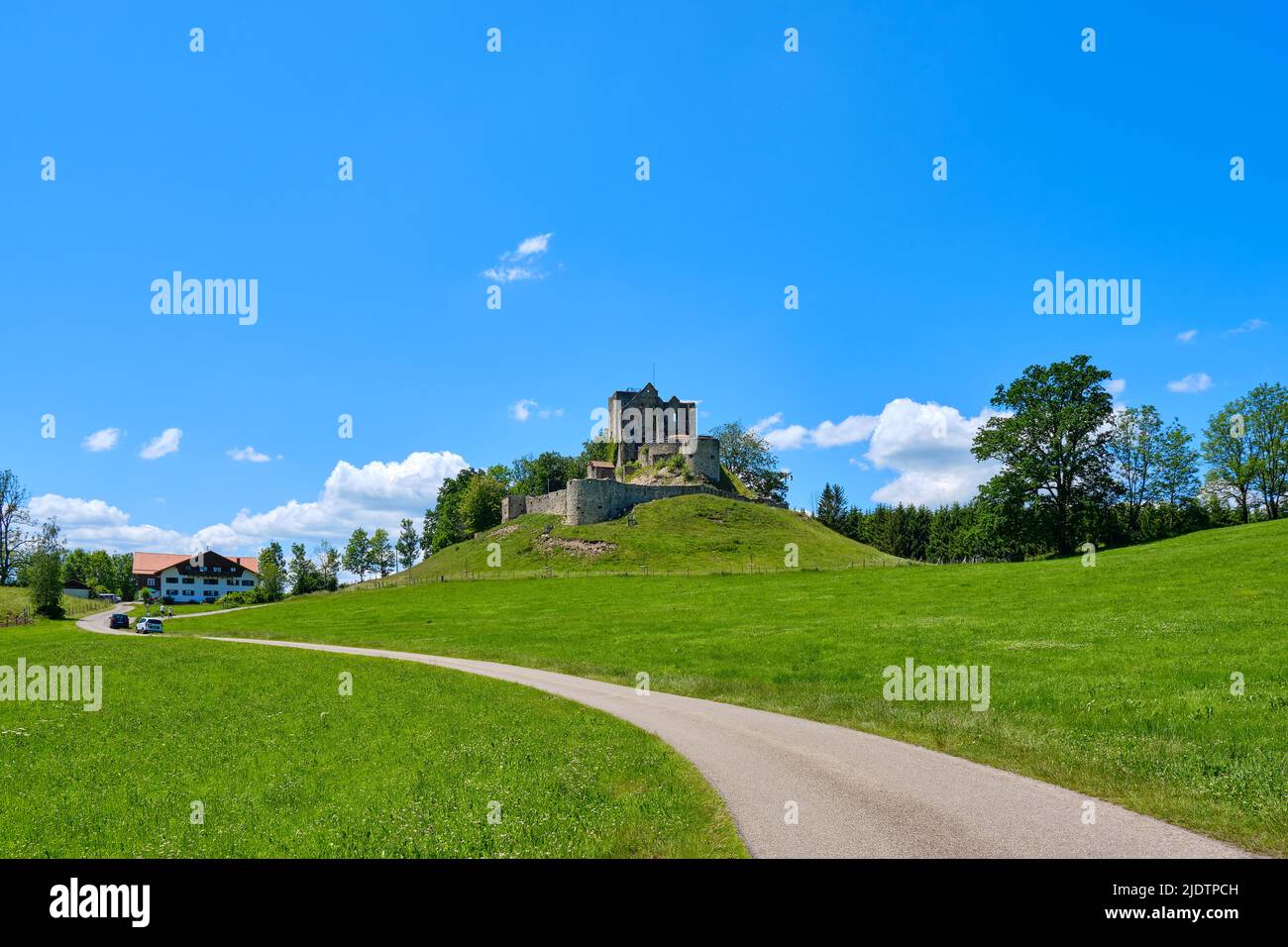 Countryside scenery and ruins of Sulzberg Castle in the Allgaeu region ...