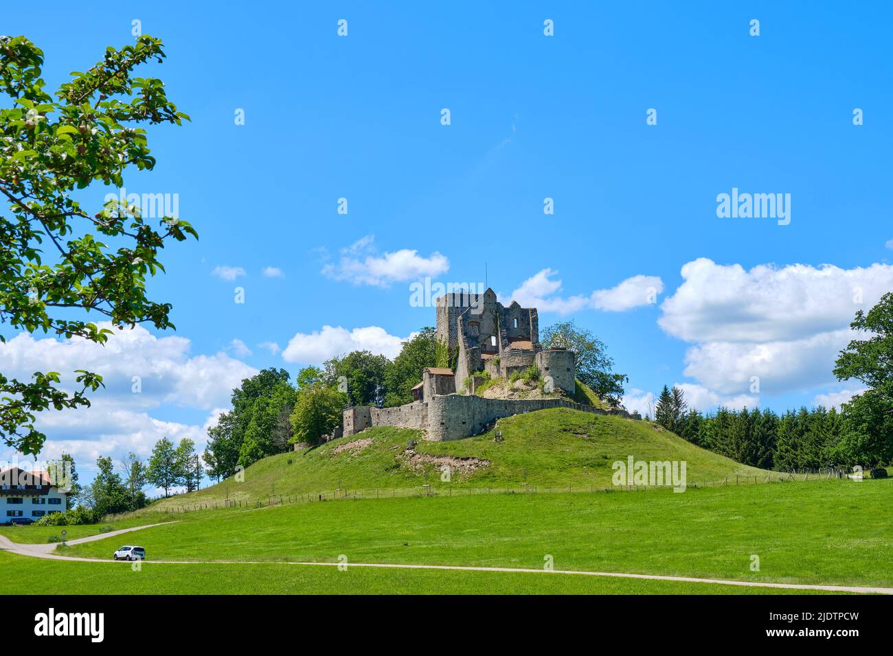 Countryside scenery and ruins of Sulzberg Castle in the Allgaeu region ...