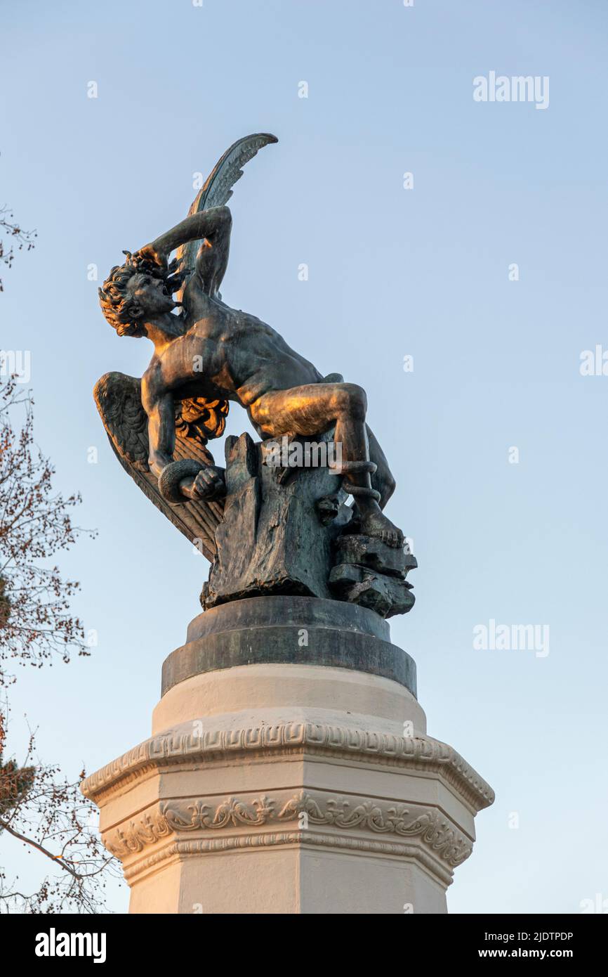 Madrid, Spain. The Fuente del Angel Caido (Monument of the Fallen Angel), a fountain located in ...