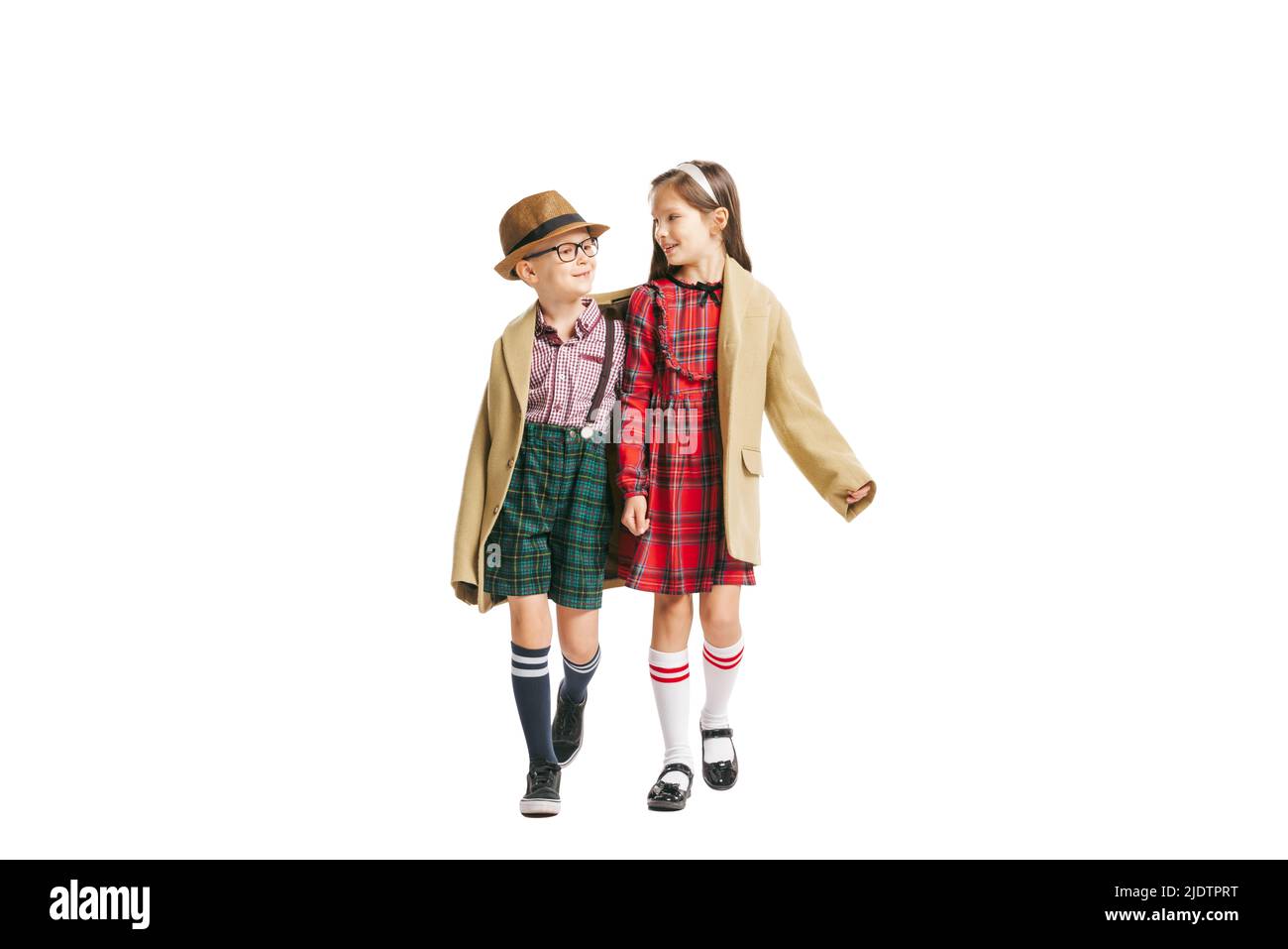 Portrait of little boy and girl, charming kids retro style outfit ...
