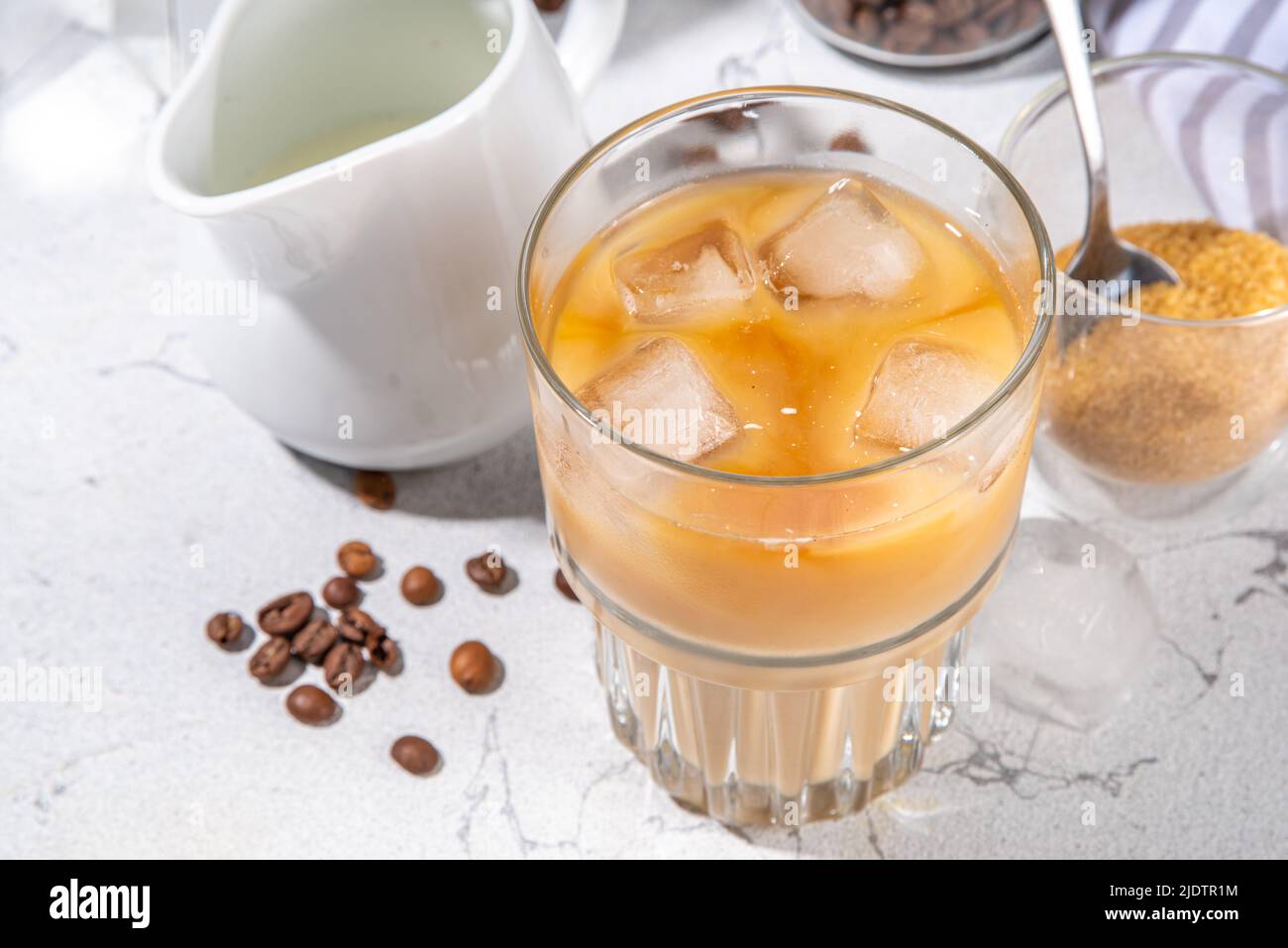 Homemade iced latte coffee, with milk poured Into Iced coffee espresso ...