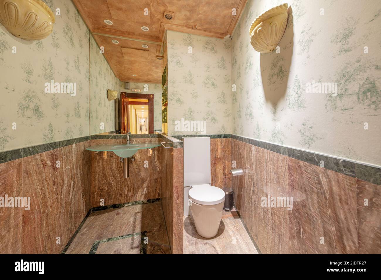 Toilet with ornate decoration in the Roman Empire style with recessed ...