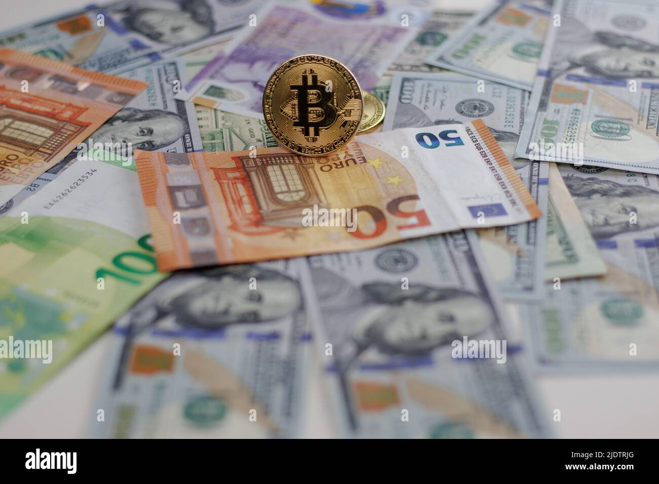 bitcoin on the background of money, cryptocurrency Stock Photo - Alamy