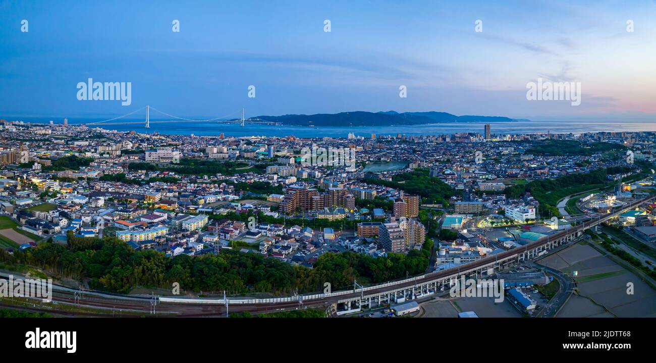 Panoramic aerial view of Akashi City and Awaji Island with bridge in ...