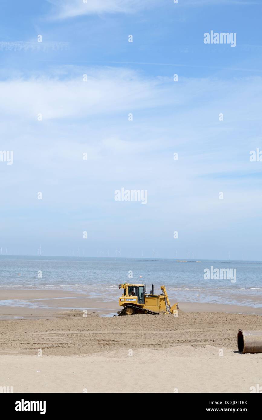 yellow bulldozer on a beach Stock Photo - Alamy