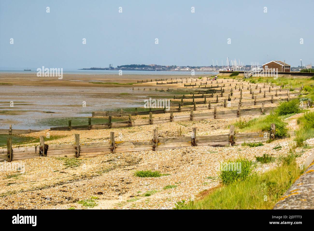 View along a shingles beach towards the town of Whitstable in the ...