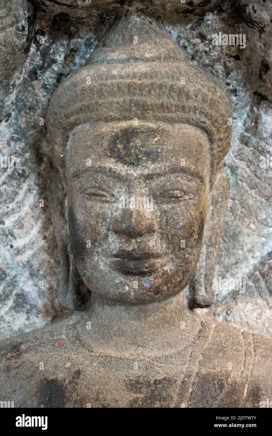 Ancient sandstone buddha Stock Photo - Alamy
