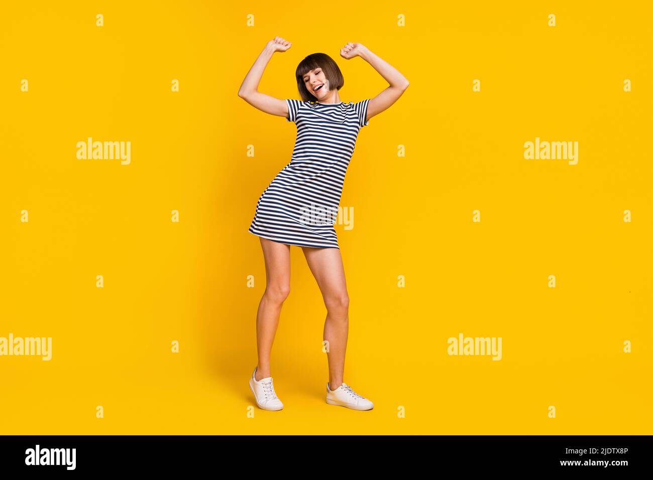 Full length photo of funky brunette young lady dance wear striped dress ...