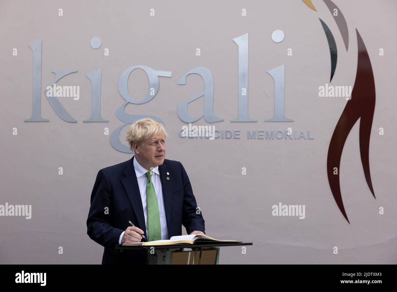 Prime Minister Boris Johnson signs the visitors book while visiting the ...