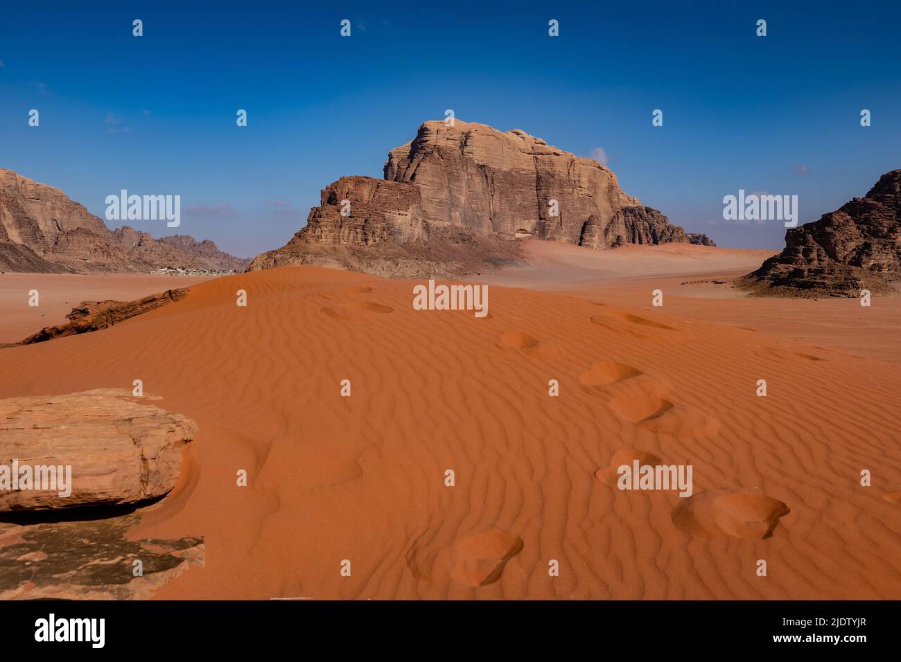 Jordan's Wadi Rum desert in sunny day, sand and rocks, blue sky Stock ...