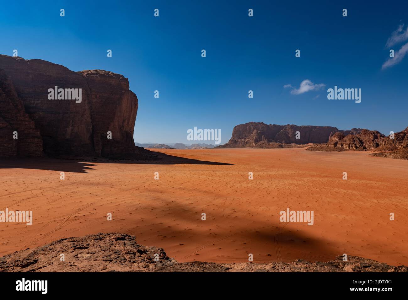 Jordan's Wadi Rum desert in sunny day, sand and rocks, blue sky Stock ...
