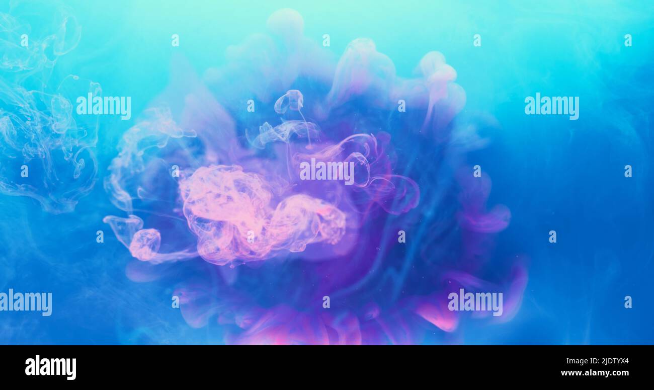 color explosion paint water splash pink blue cloud Stock Photo - Alamy