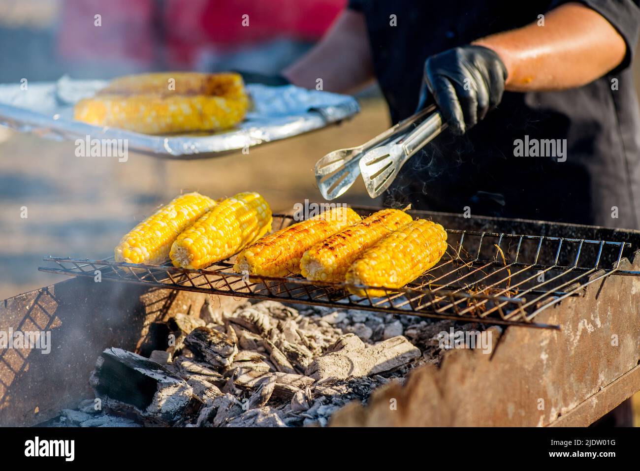 Family meal outside hands hi-res stock photography and images - Alamy