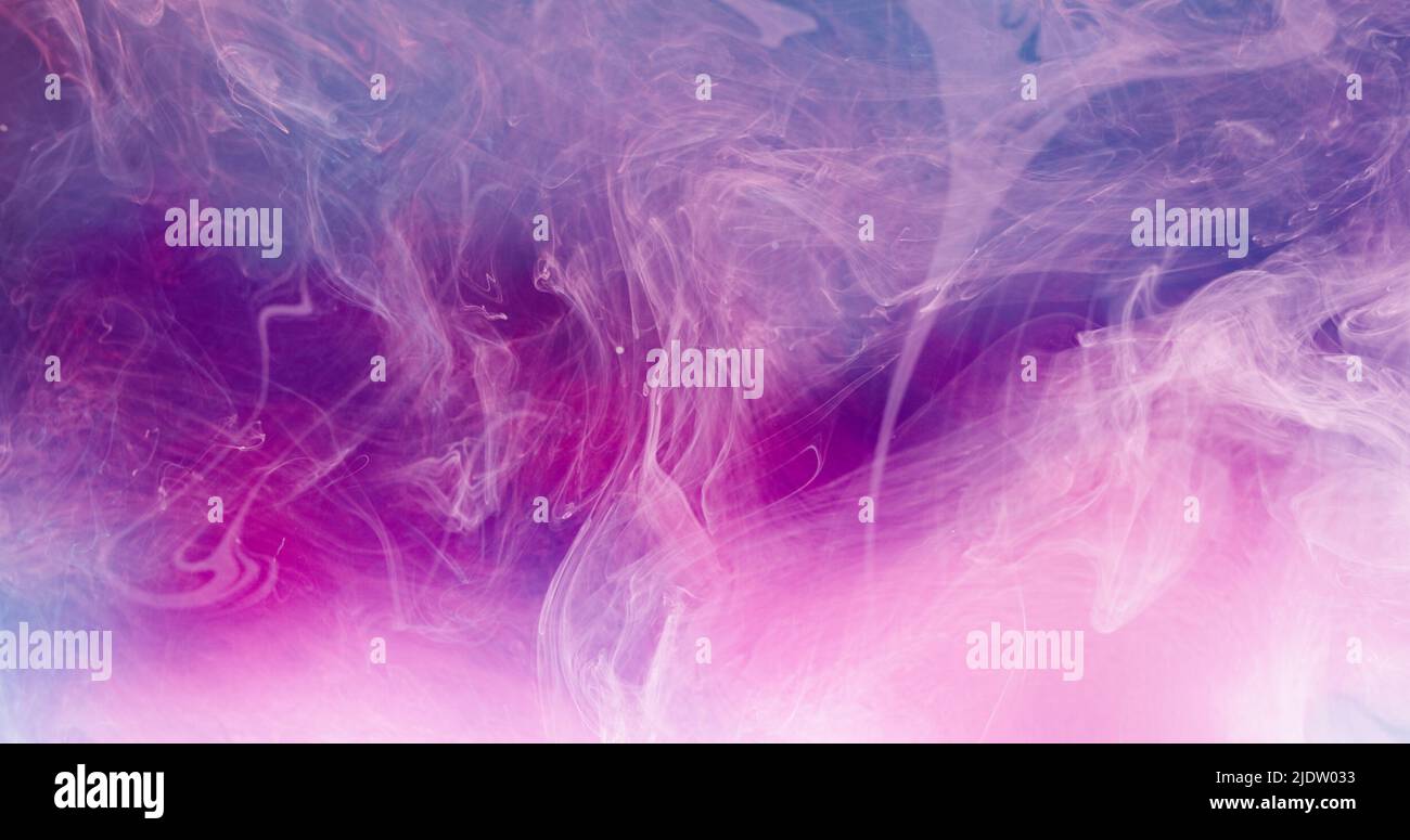 color explosion paint water pink blue flash light Stock Photo - Alamy