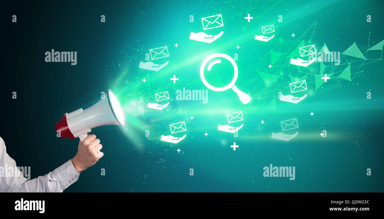 Young person with megaphone and technology related icon Stock Photo - Alamy