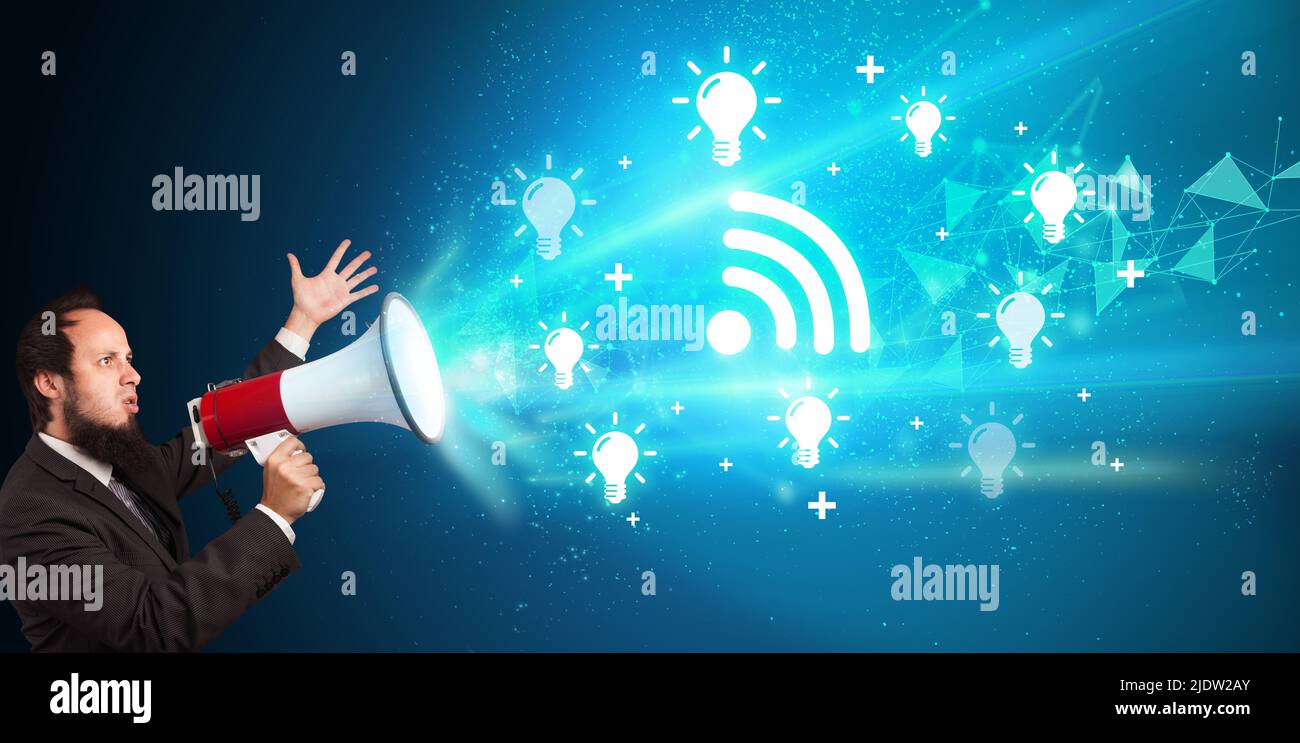 Young person with megaphone and technology related icon Stock Photo - Alamy