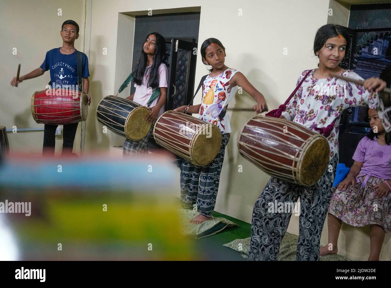 Lalitpur, Nepal. 23rd June, 2022. Student devotees rehearse traditional ...