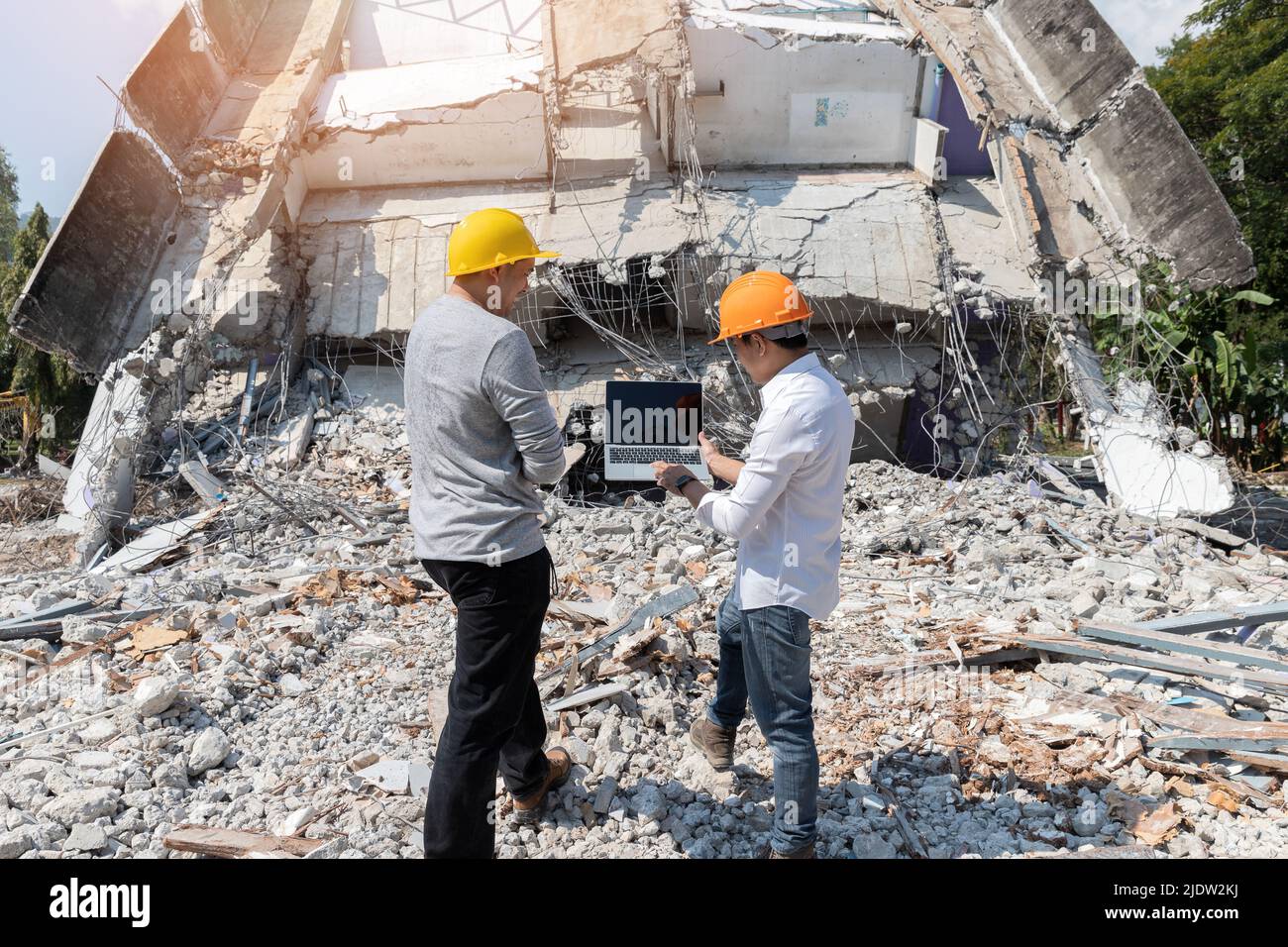 Demolition control supervisor and contractor discussing on demolish ...
