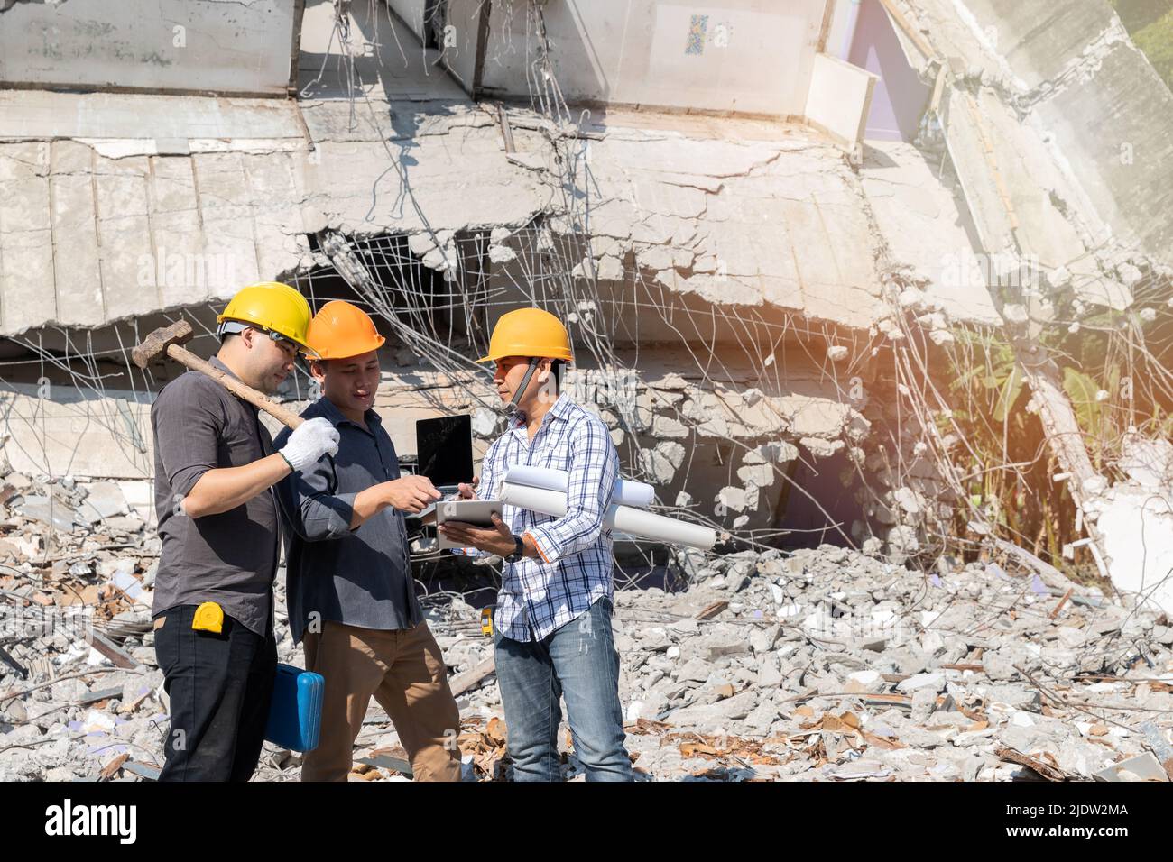 Demolition control supervisor and contractor discussing on demolish ...