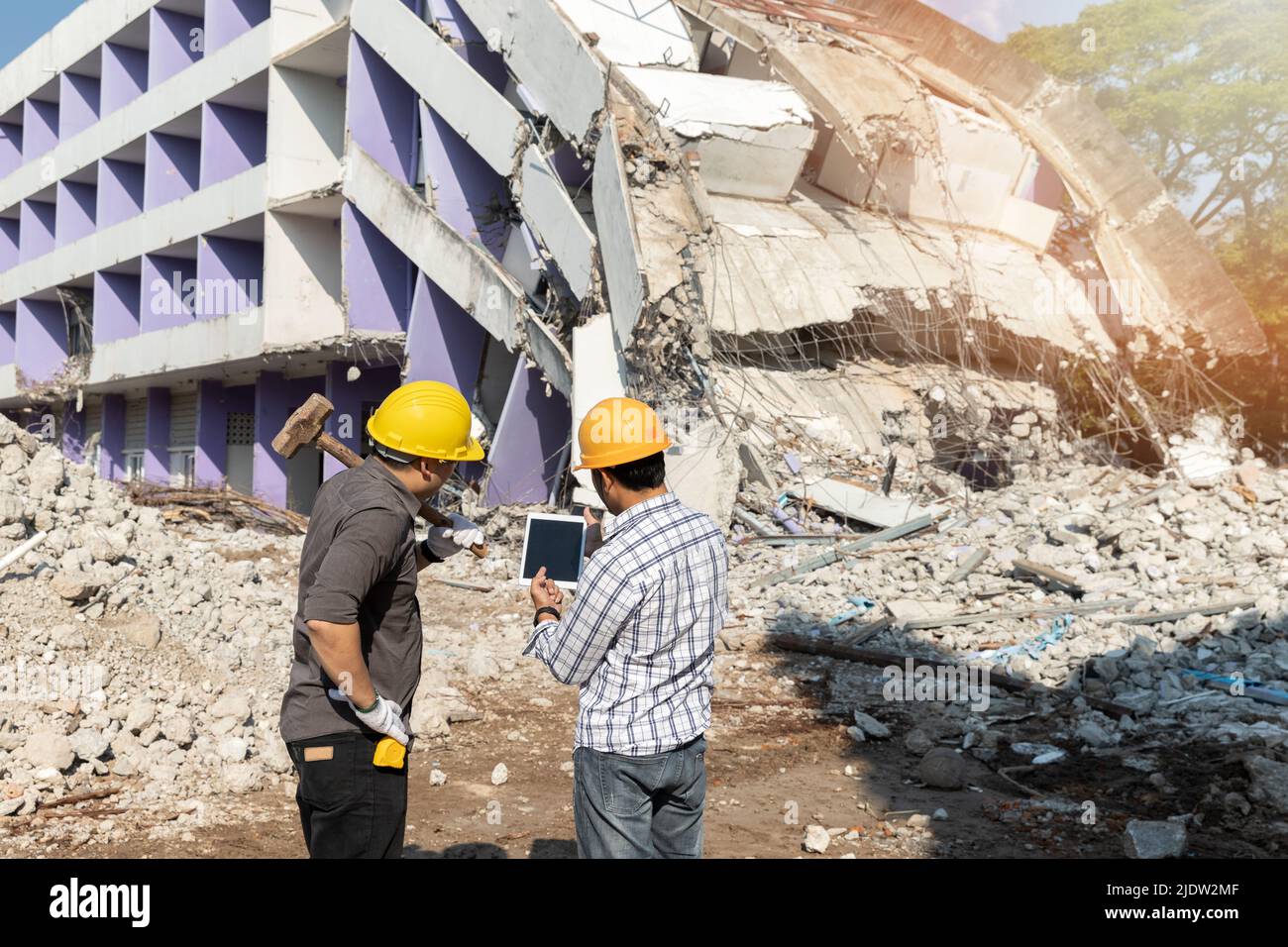 Demolition control supervisor and contractor discussing on demolish ...