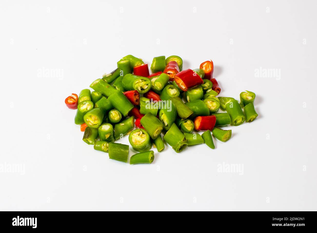 Fresh red chilli, and green chilli, finely chopped, mix together on a ...