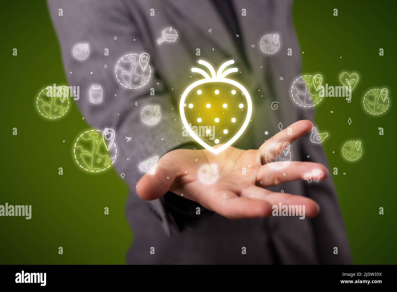 Hand holding food related icons Stock Photo - Alamy