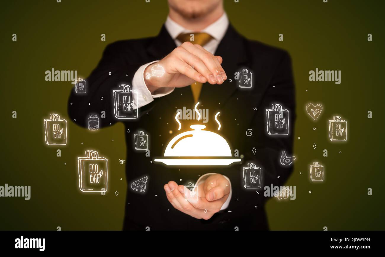 Hand holding food related icons Stock Photo - Alamy