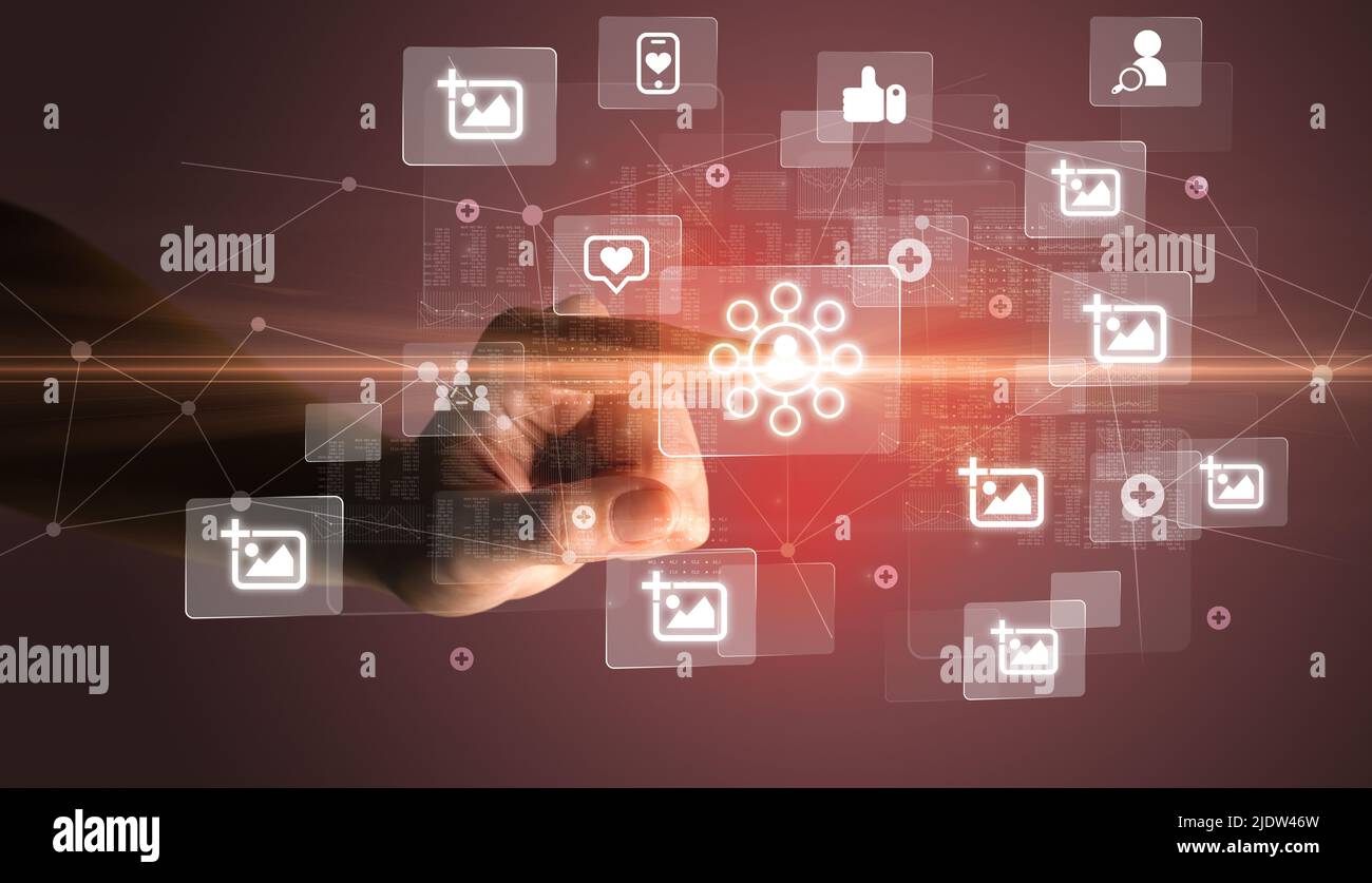 Hand pressing social media multimedia application screen with media ...