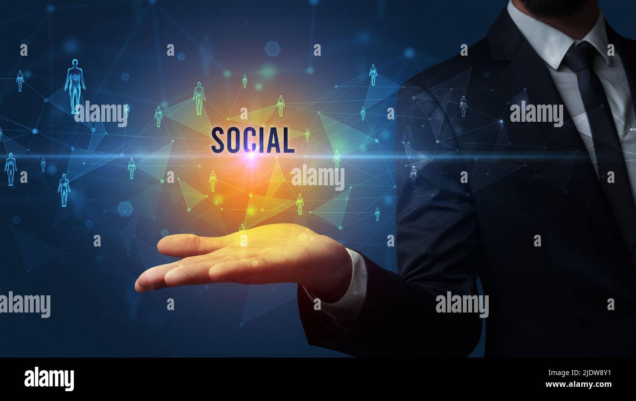 Hand holding social media related inscription Stock Photo - Alamy