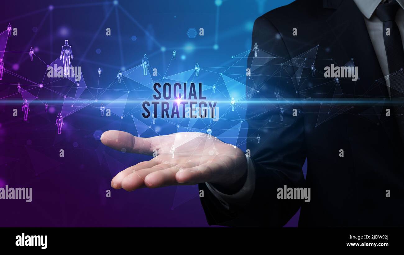 Hand holding social media related inscription Stock Photo - Alamy