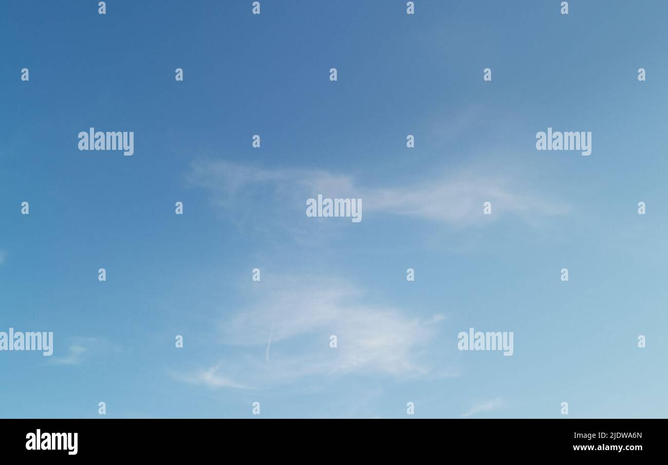 Full frame of pretty blue sky with wispy white cloud formation Stock ...