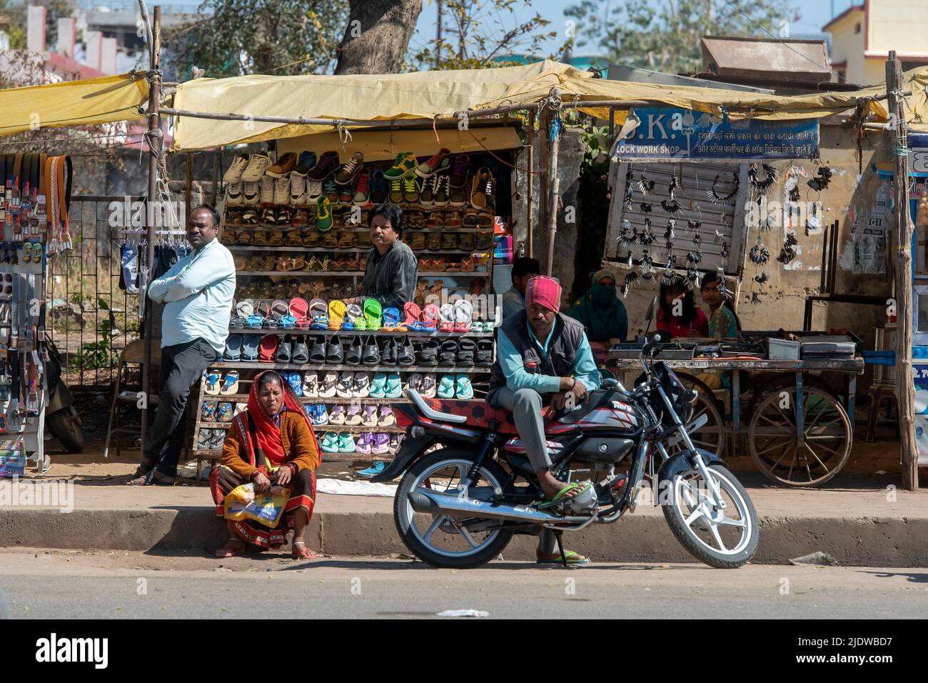 Sellings shoes and other items on the street of Seoni, madhya Pradesh ...