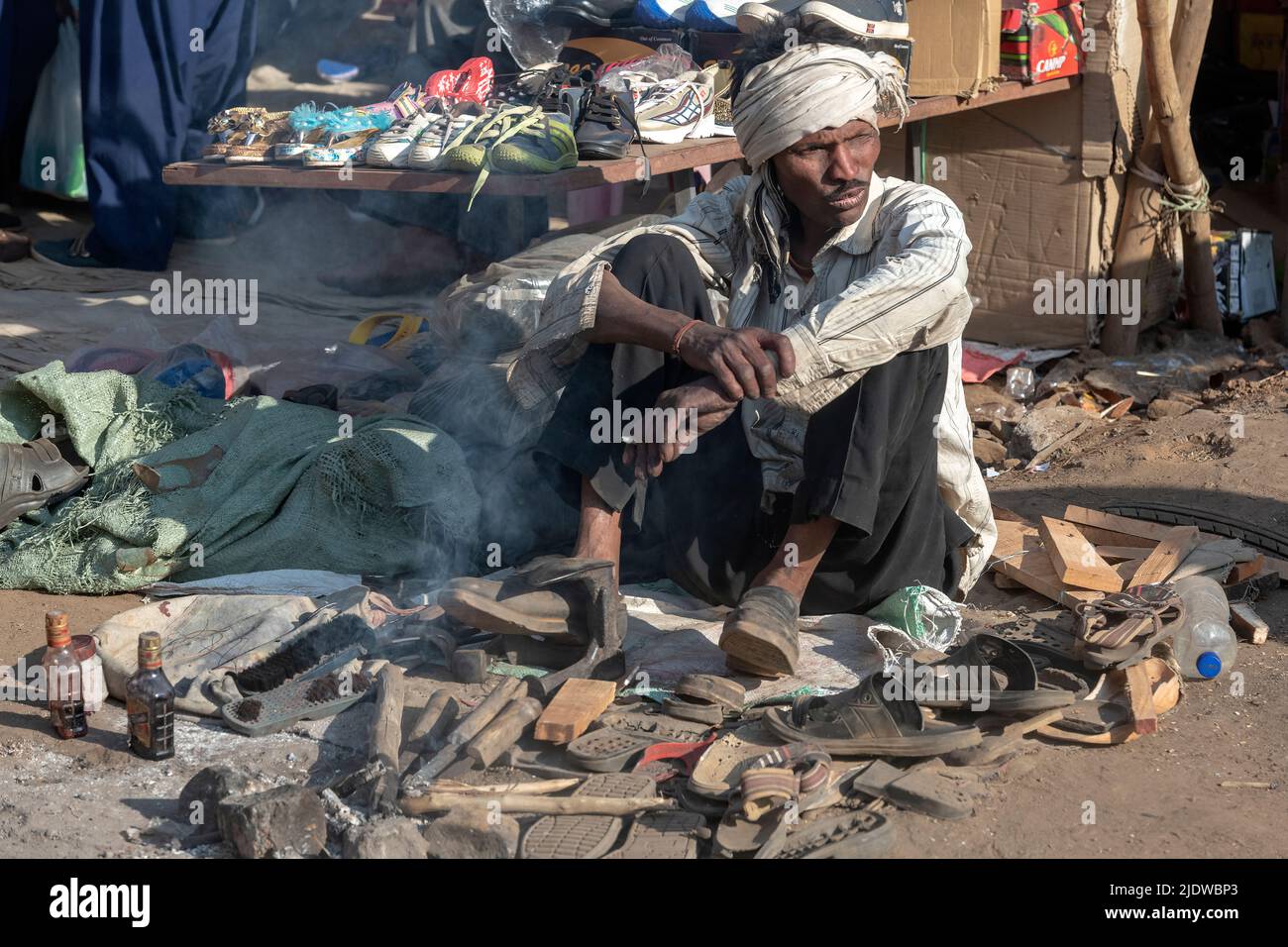 Shoemaker on the street of Shahpura, Madhya Pradesh, India Stock Photo ...