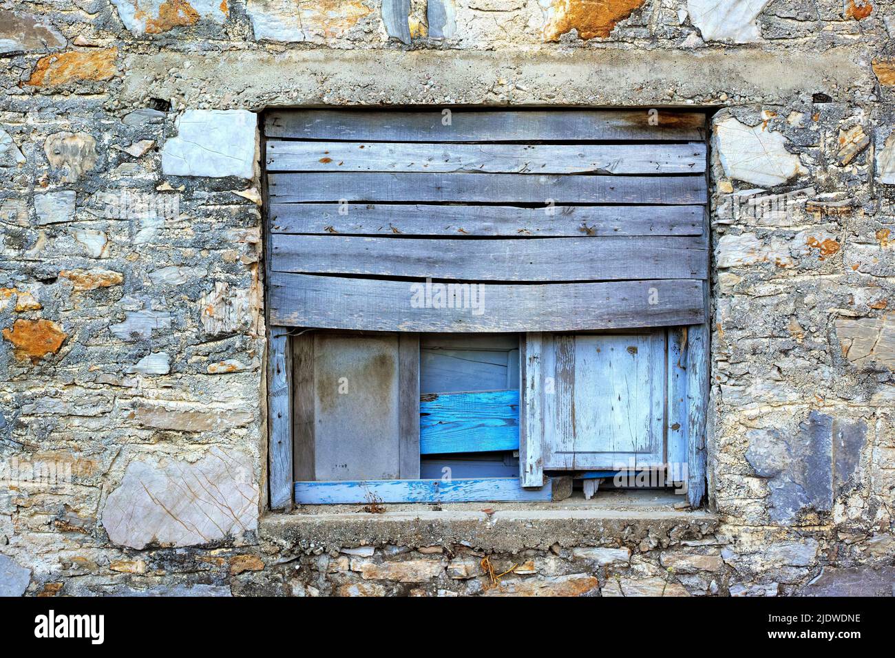 Closeup of an old wooden window on an ancient farmhouse. Historic ...