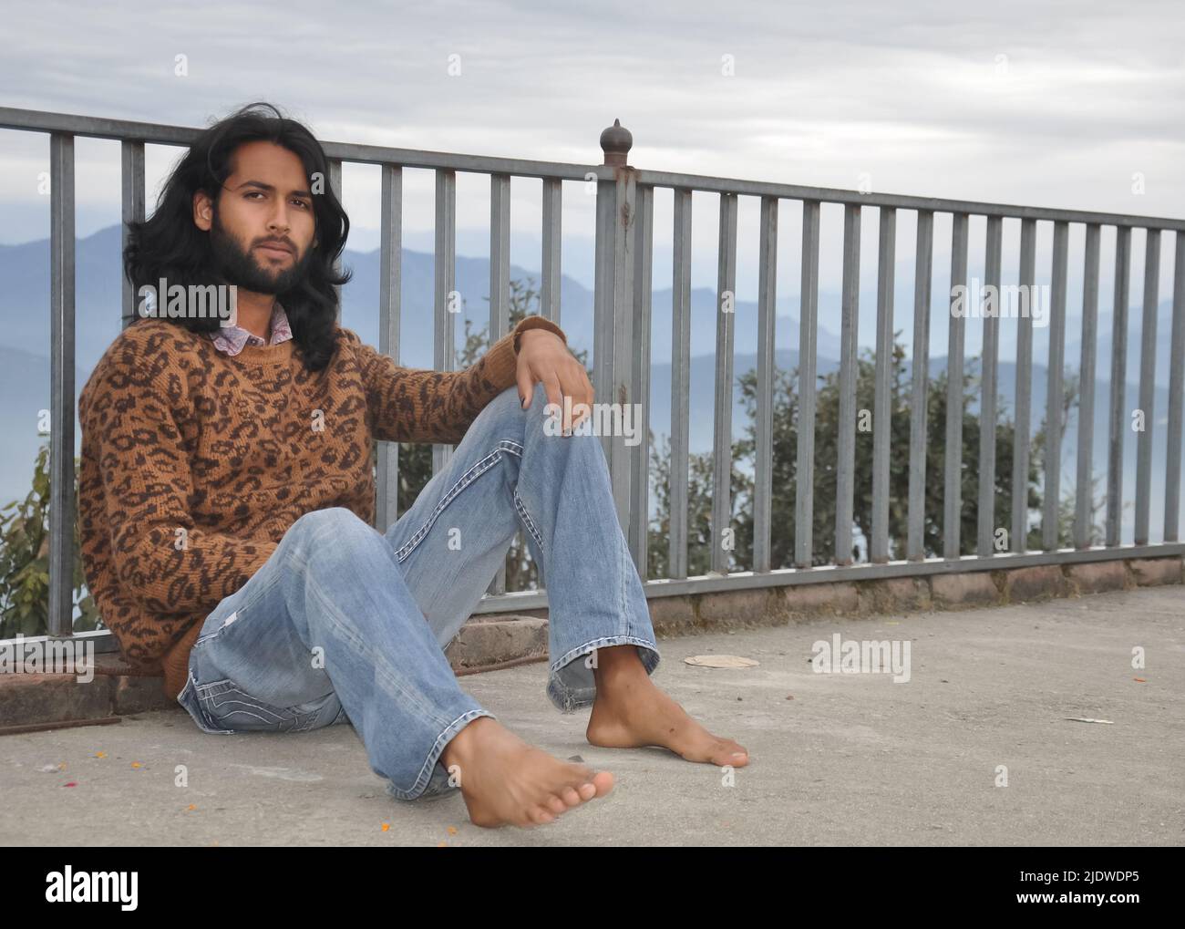 South indian man sitting on hi-res stock photography and images - Alamy