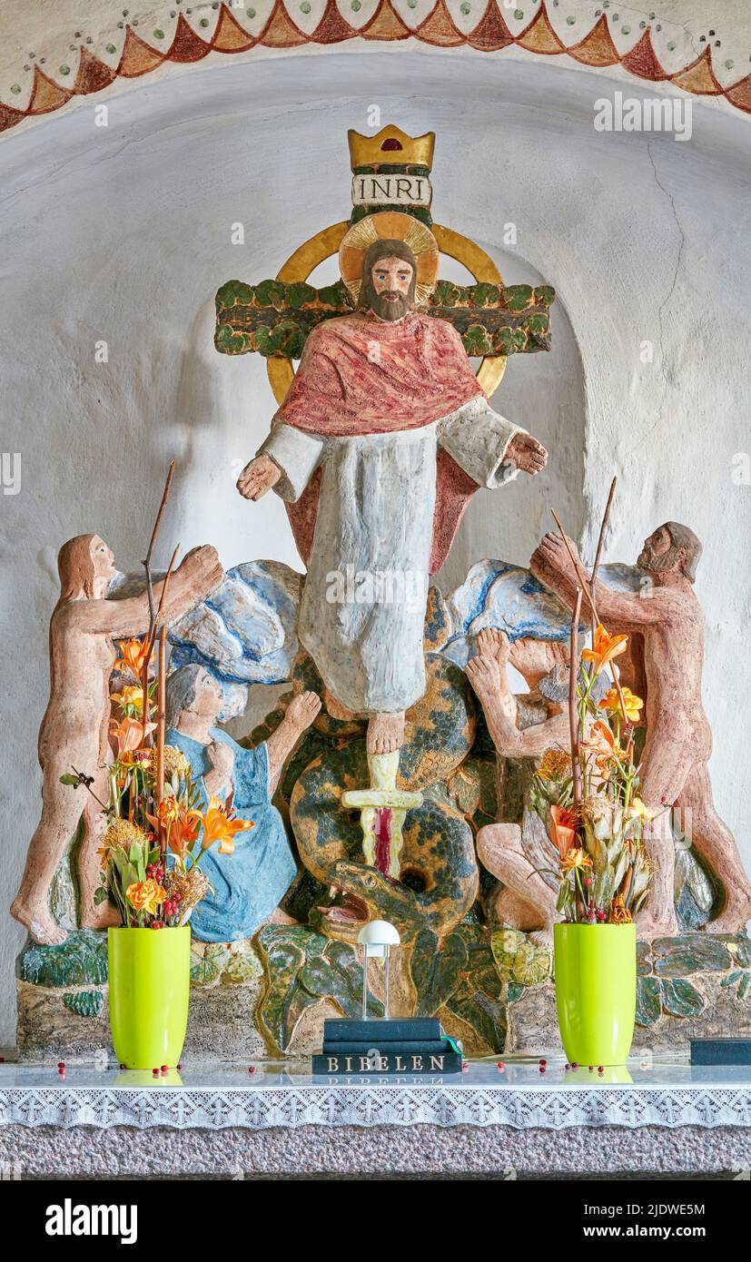 Closeup of an alter at a historic church with Jesus on a cross. 12th ...