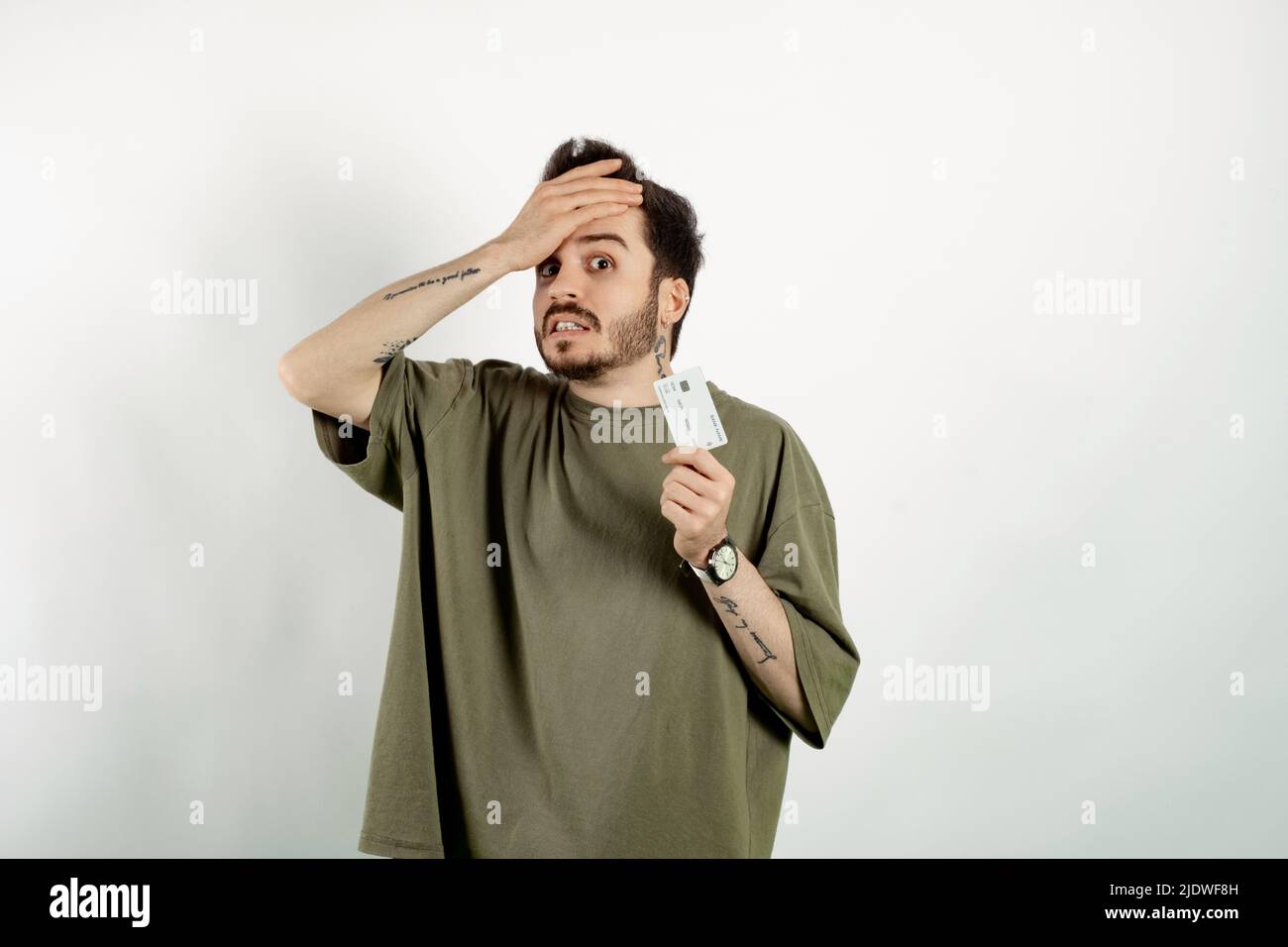Caucasian young man wearing t-shirt posing isolated over white ...