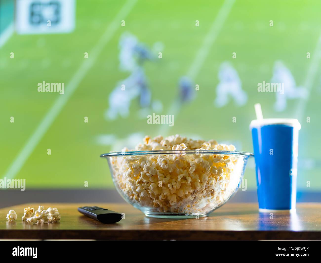 Popular American fast food popcorn in a clear glass bowl and a ...