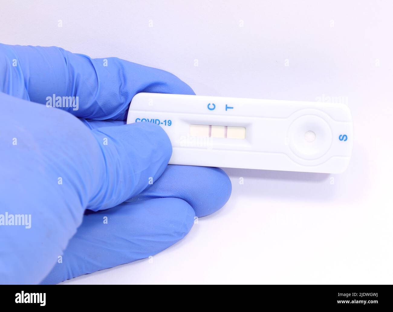 Glove showing positive result with two lines of antigen test to detect ...