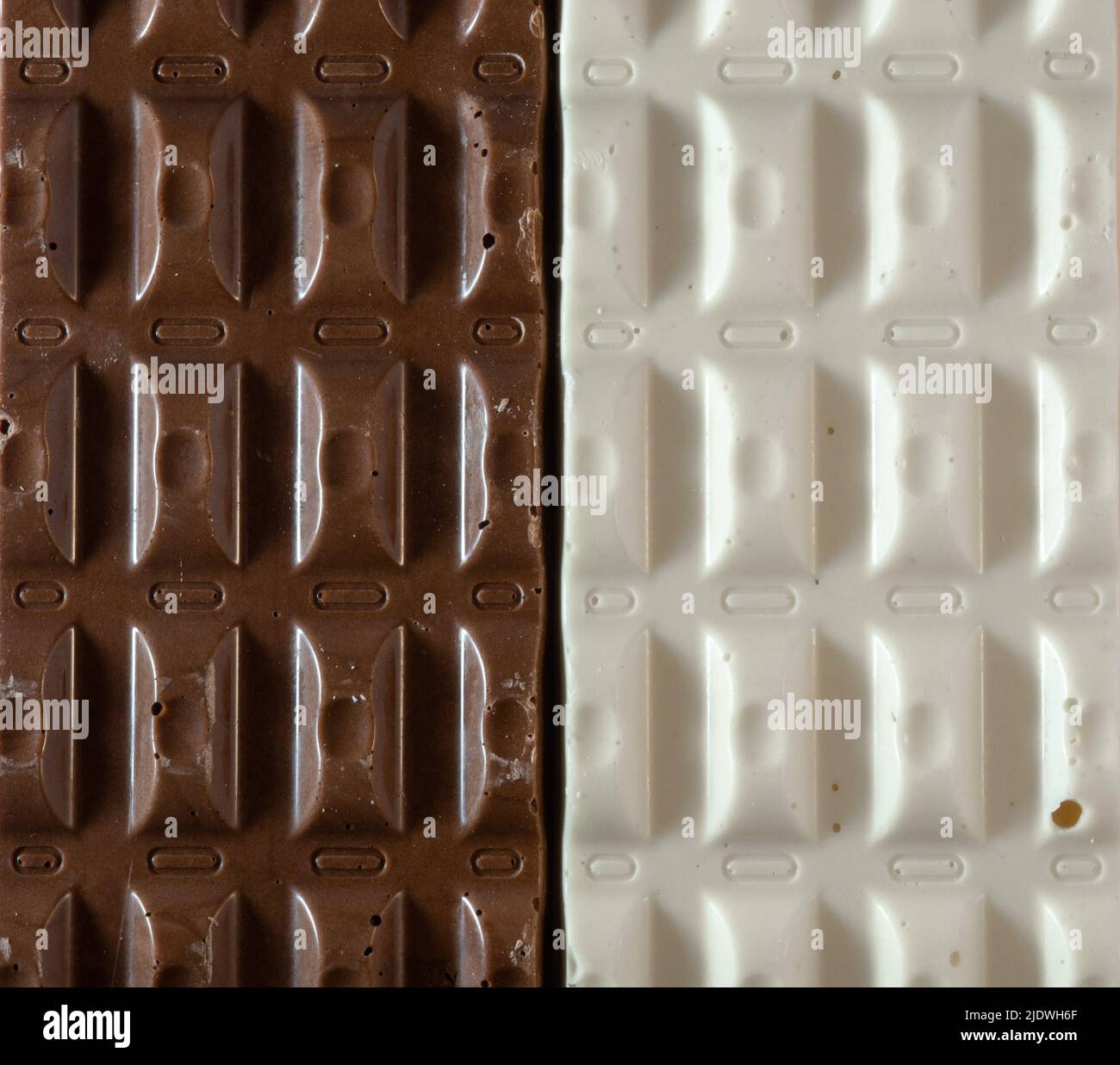 Dark and white chocolate. Chocolate background. Contrast of chocolate ...