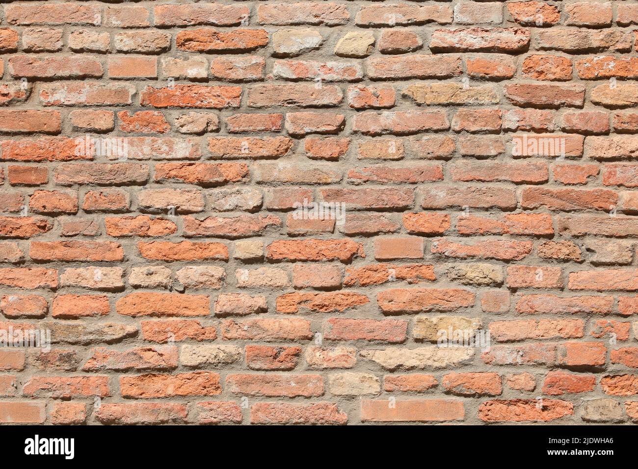 the wall made of bricks and lime and cement of a house Stock Photo - Alamy