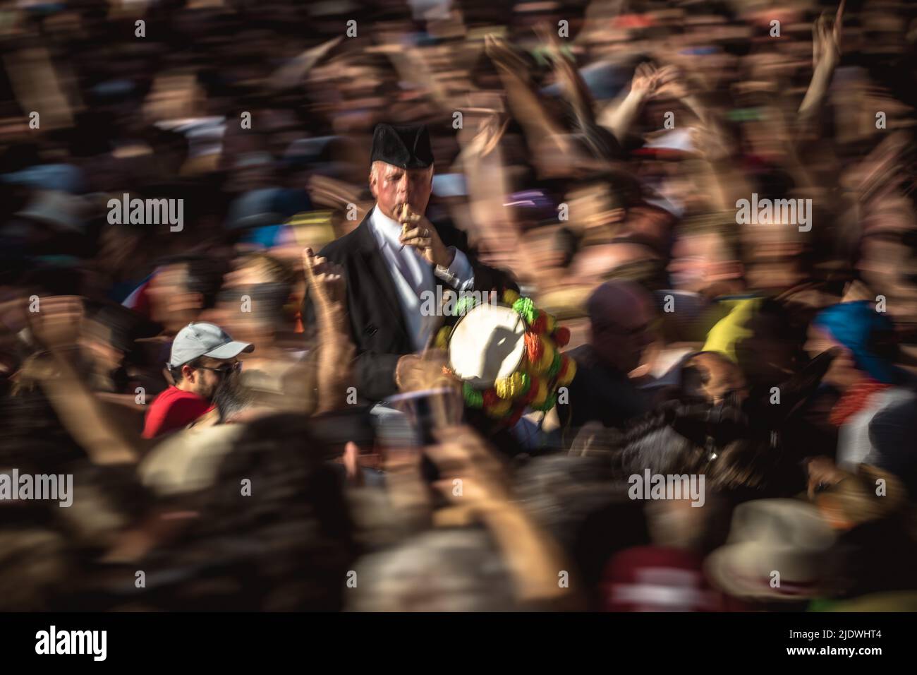 Ciutadella, Spain. 23rd June, 2022. A 'caixer' (horse rider) rears up ...