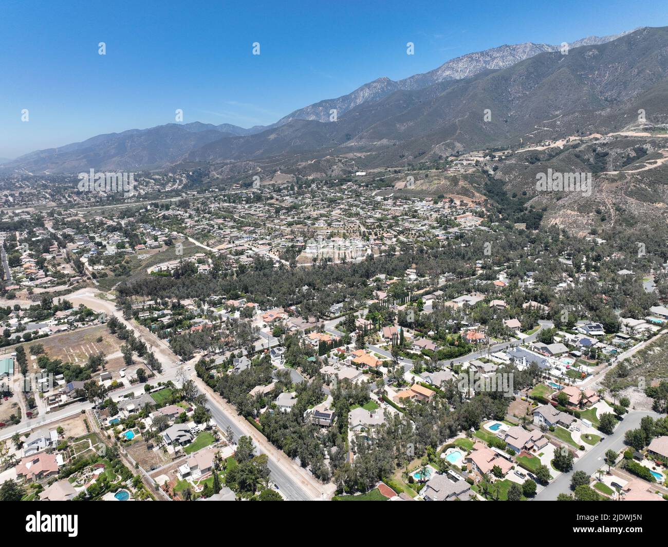 Aerial view of wealthy Alta Loma community and mountain range, Rancho ...